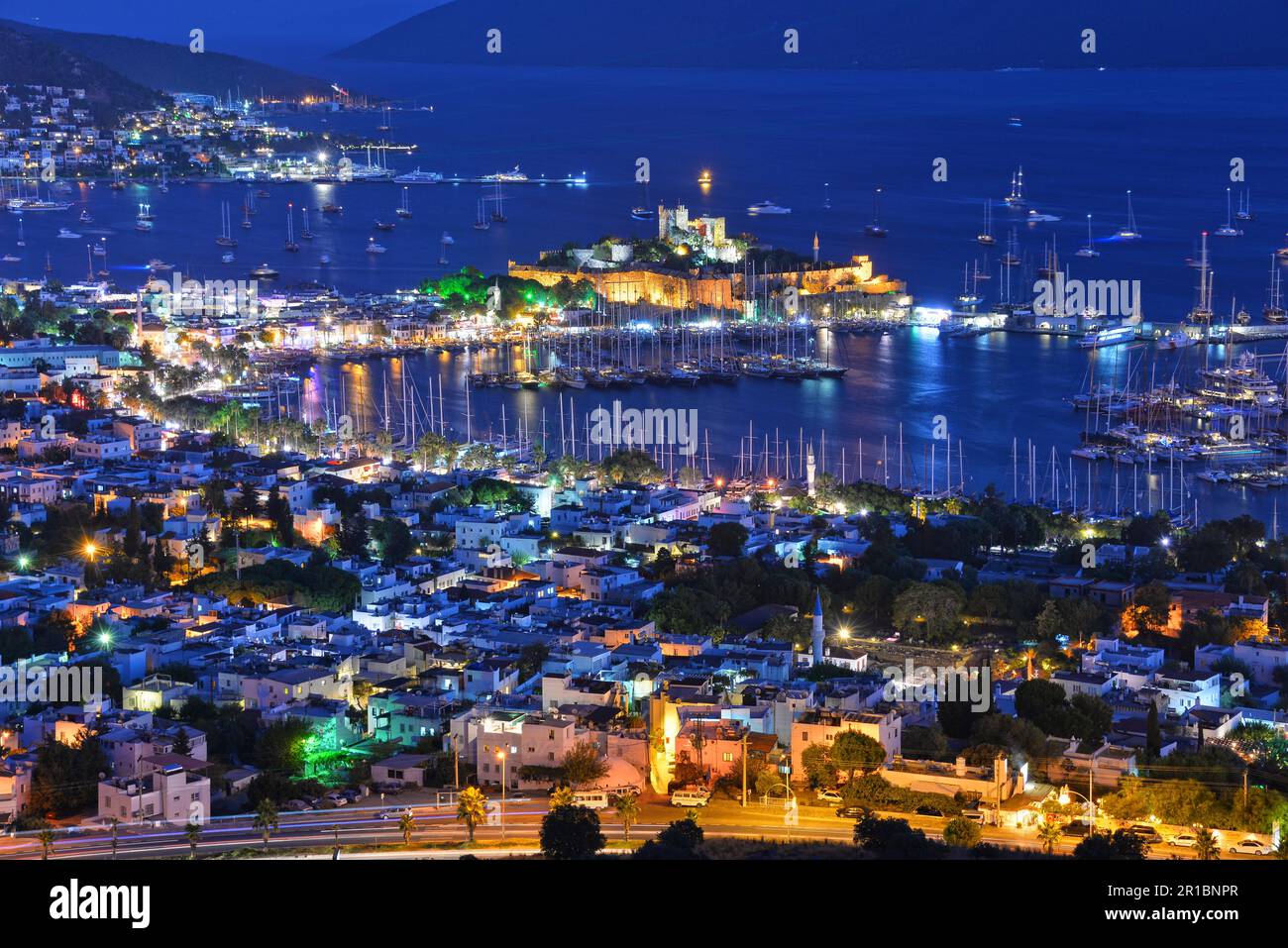 View of Bodrum harbor and Castle of St. Peter by night. Turkish Riviera ...