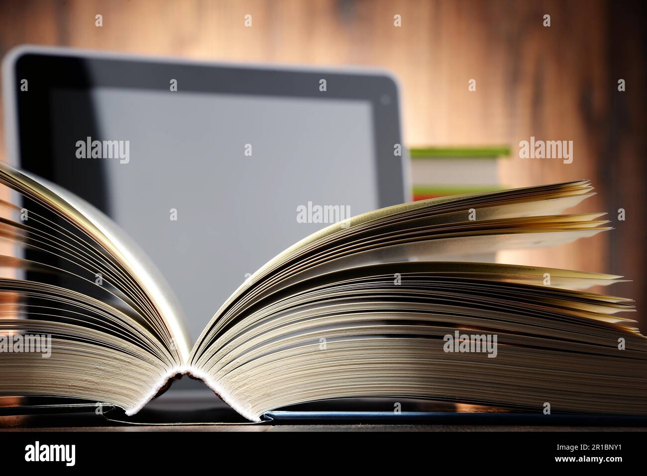 Composition with books and tablet computer Stock Photo - Alamy
