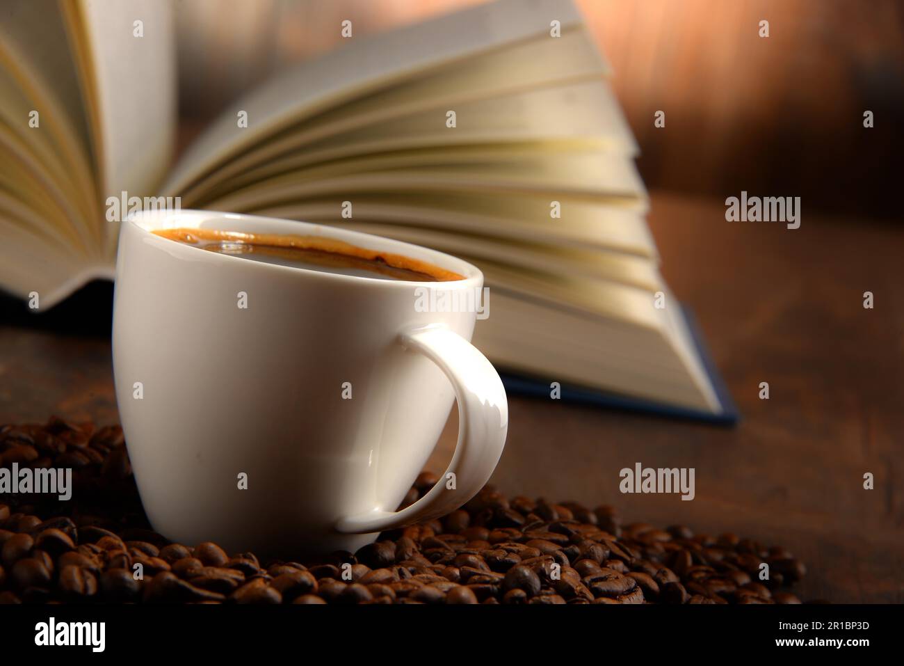 Open book glass cup hi-res stock photography and images - Alamy