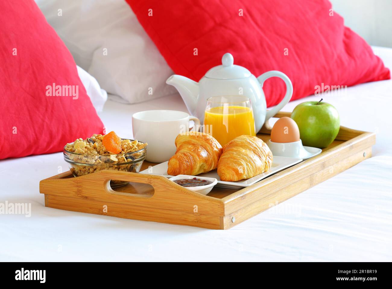 Breakfast on tray in bed in hotel room Stock Photo - Alamy