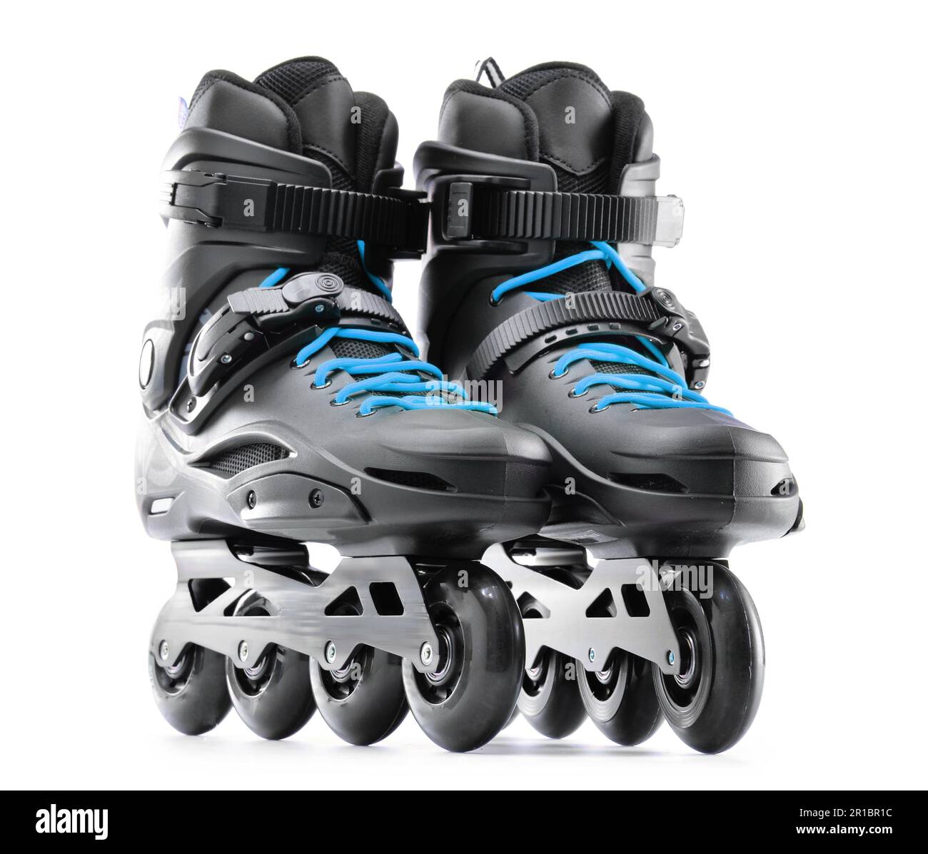 Pair of inline skates isolated on white background Stock Photo - Alamy