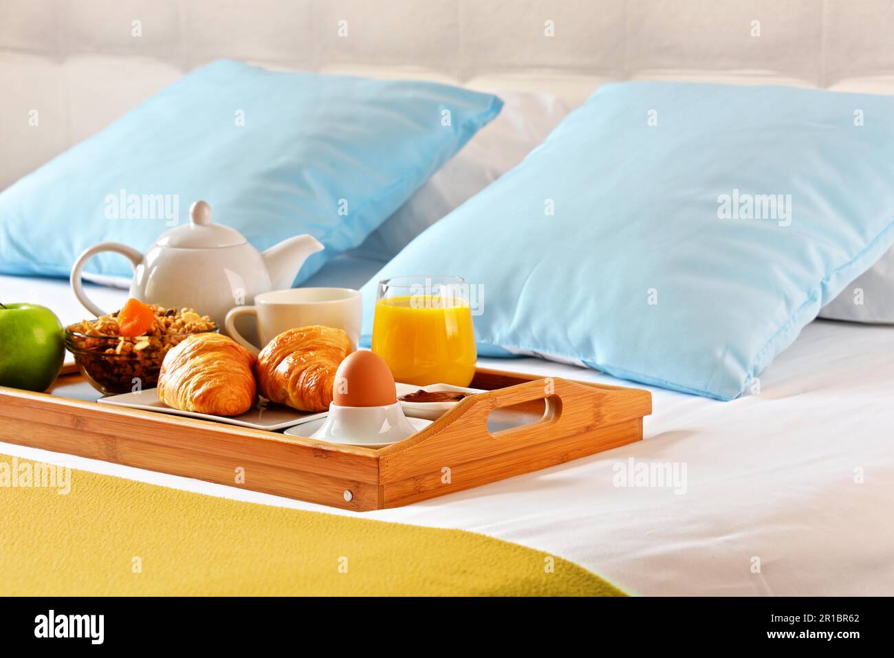 Breakfast on tray in bed in hotel room Stock Photo - Alamy