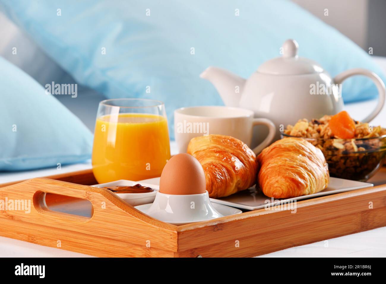 Breakfast on tray in bed in hotel room Stock Photo - Alamy