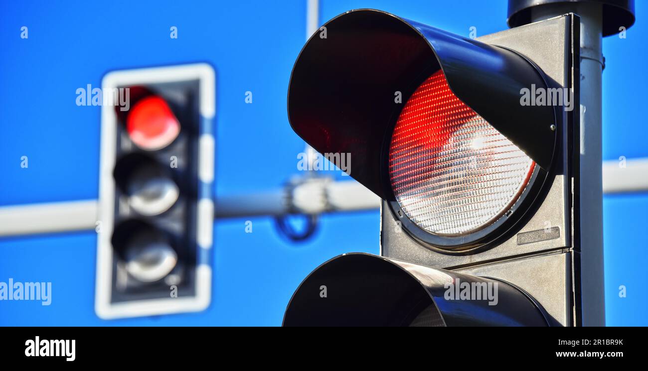 Traffic lights over blue sky. Red light Stock Photo - Alamy