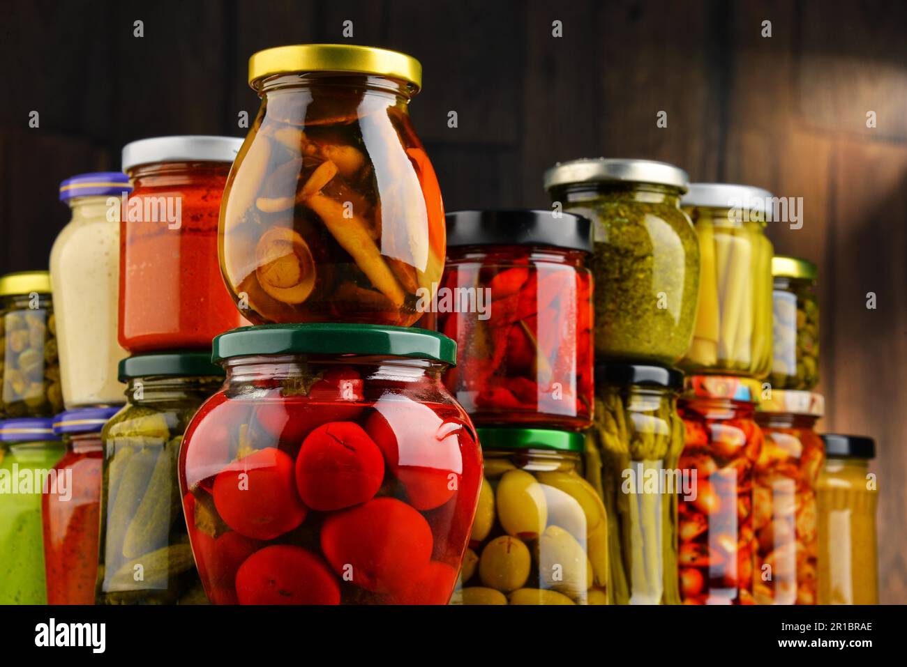Jars with variety of pickled vegetables. Preserved food Stock Photo - Alamy