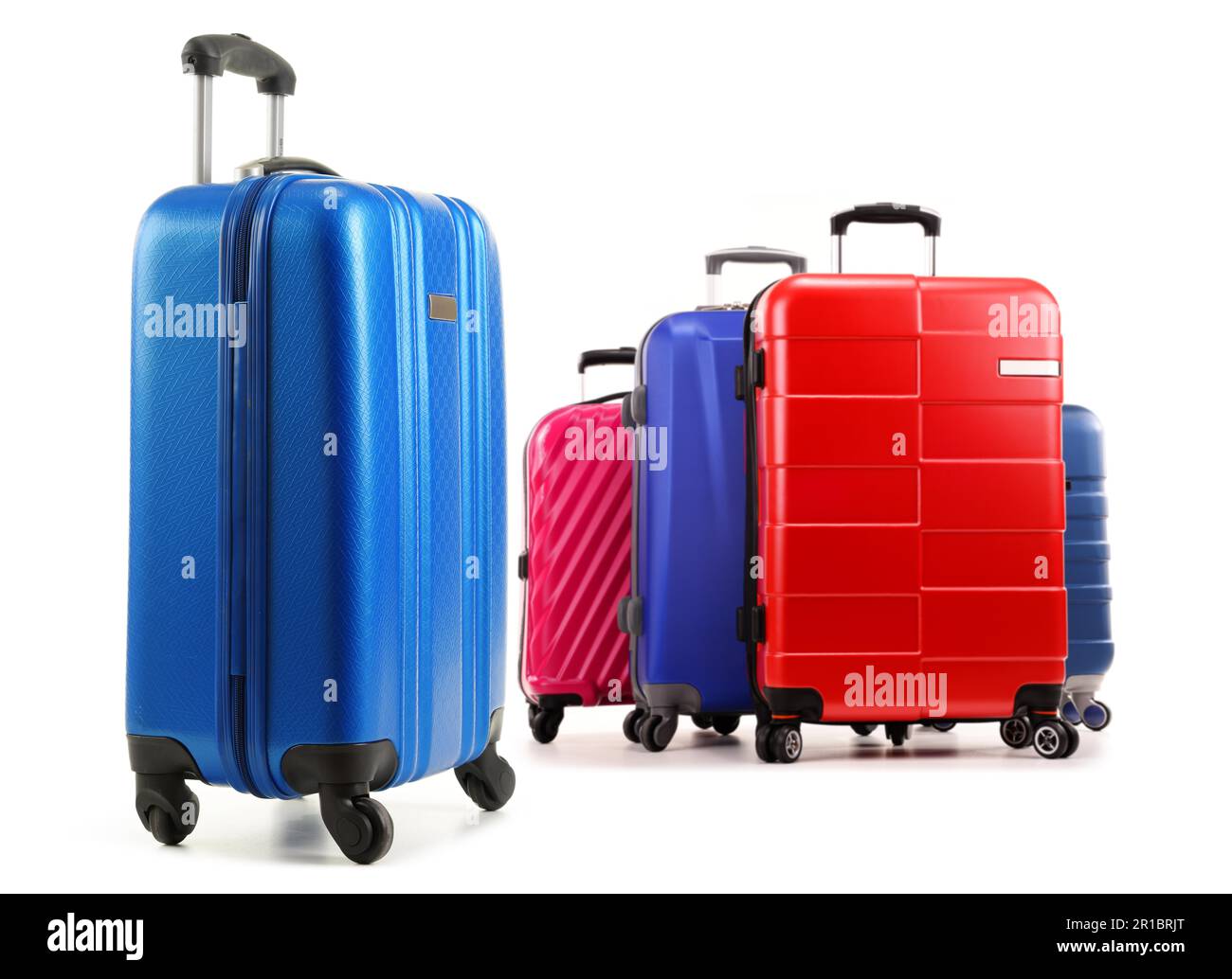 Travel suitcases isolated on white background Stock Photo - Alamy
