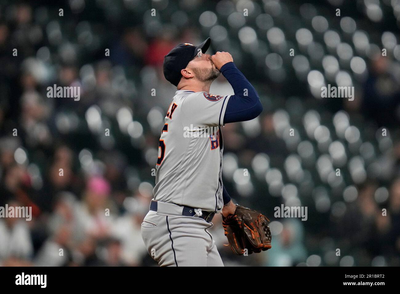 Houston Astros relief pitcher Ryan Pressly celebrates the final out in ...