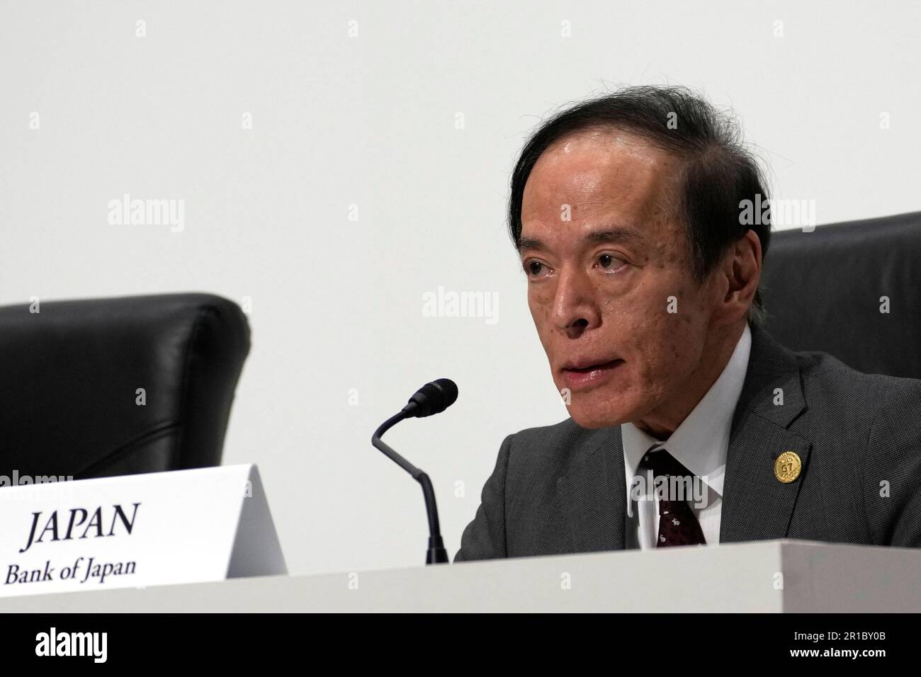 Governor of the Bank of Japan Kazuo Ueda speaks during the presidency ...