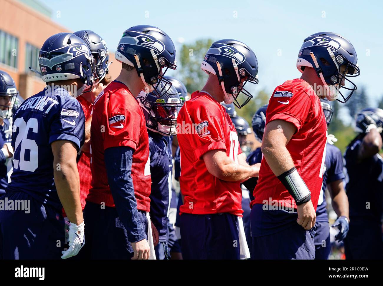 The quarterbacks group lines up for a drill during the NFL football ...