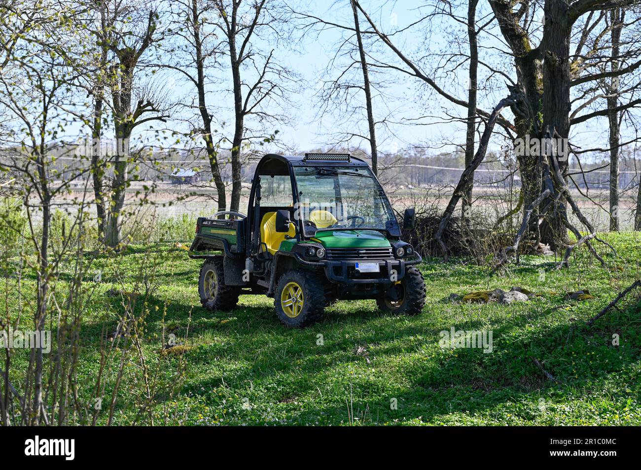 Working car standing in green nature reserve Stock Photo - Alamy