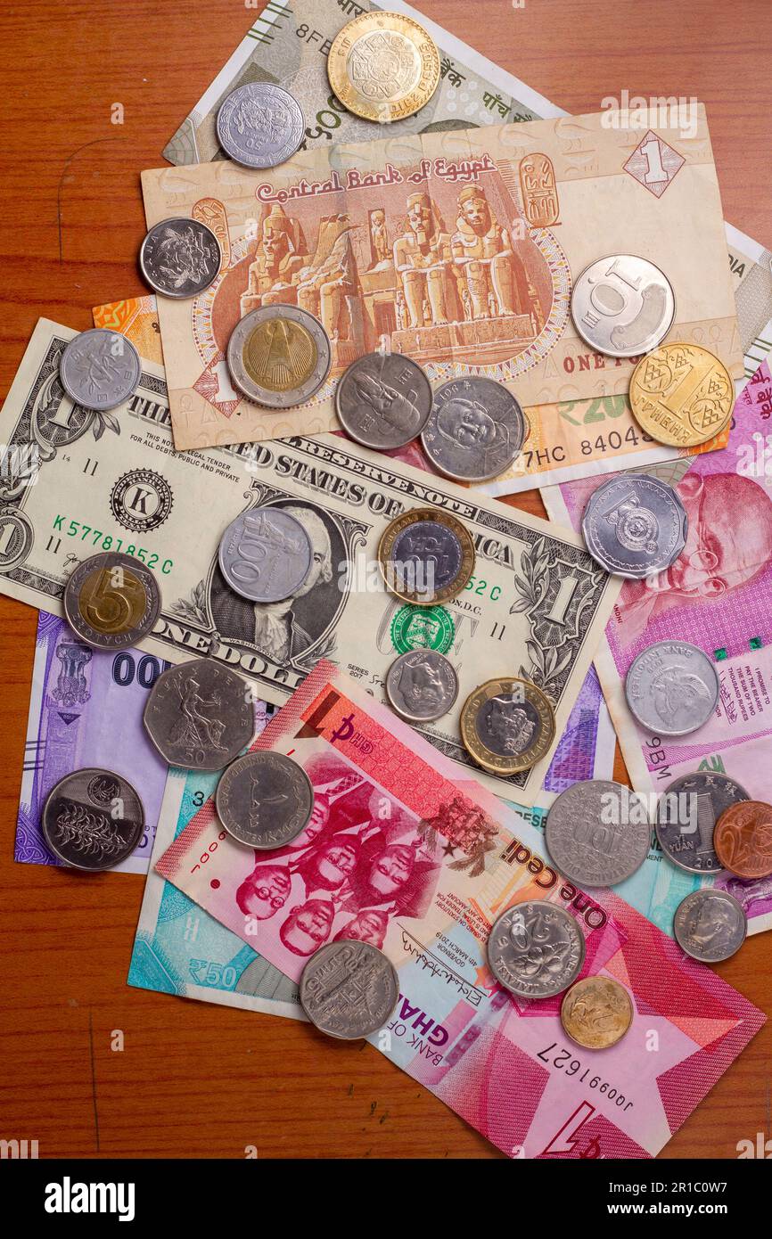 Major currencies in the world. notes and coins background Stock Photo ...