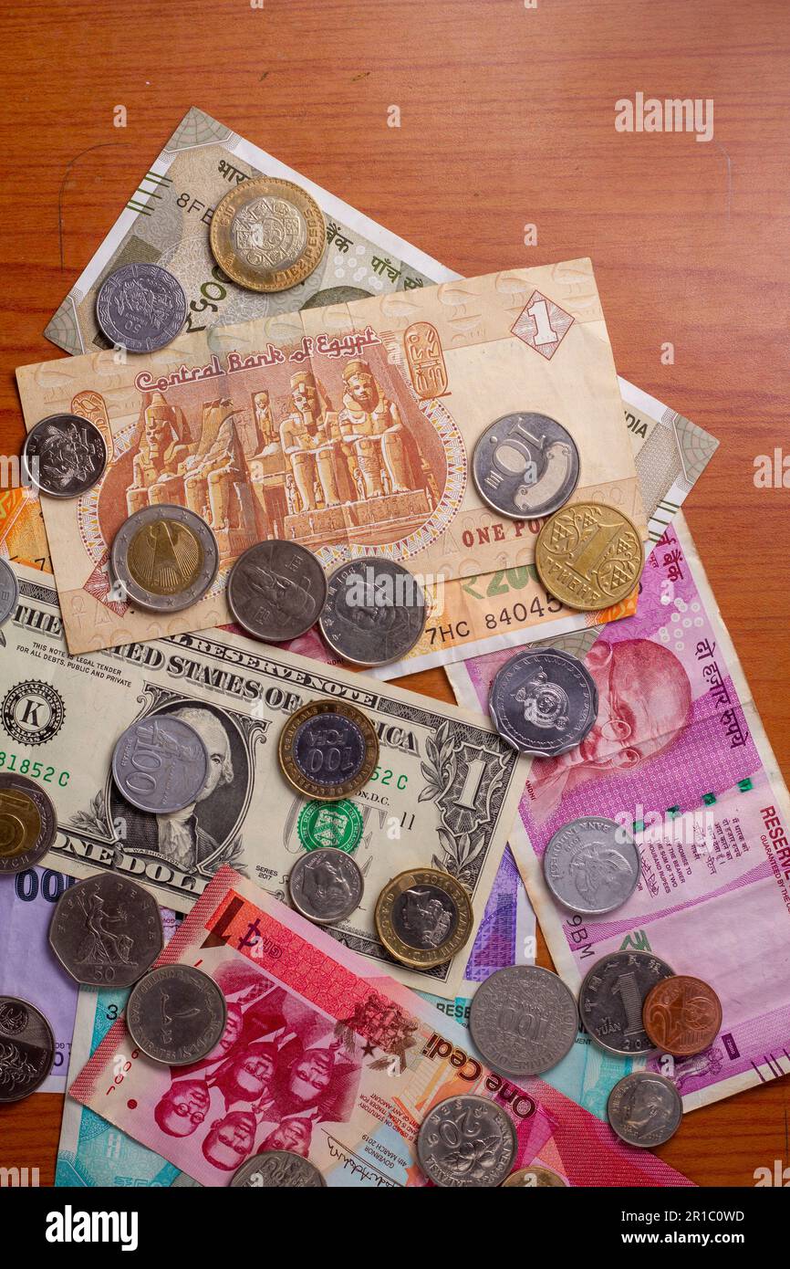 Major currencies in the world. notes and coins background Stock Photo ...