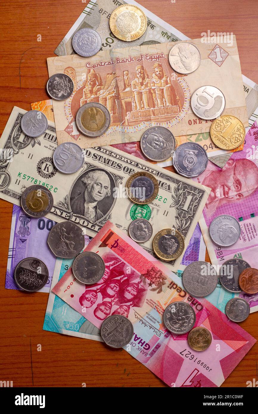 Major currencies in the world. notes and coins background Stock Photo ...
