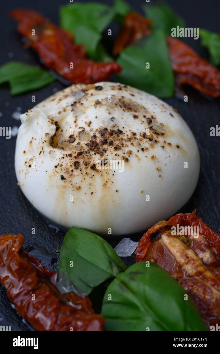 Burrata, an Italian Cow Milk Cheese made from Mozzarella, Stracciatella ...