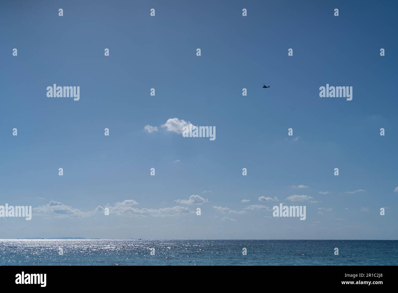 Bell Boeing V-22 Osprey of U.S. Marine Corps flying over ocean near ...