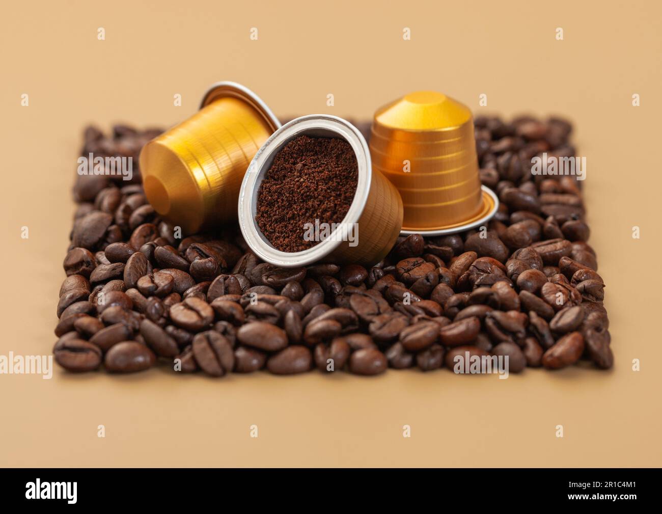 Coffee capsules suitable for machine on square coffee beans texture on ...