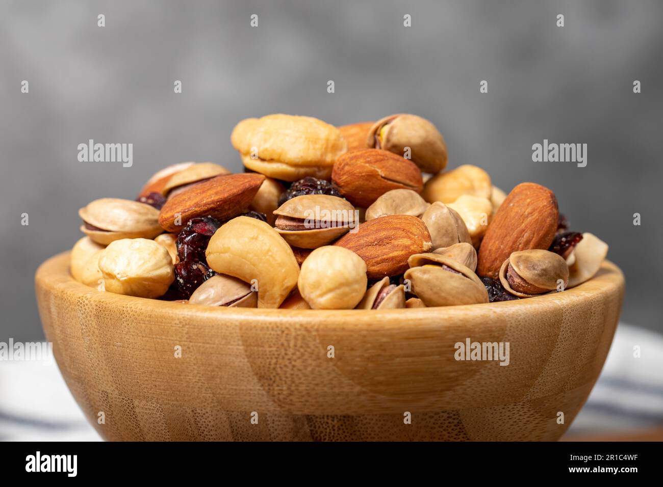Mixed nuts. Special mixed nuts in wooden bowl. Hazelnut, almond, cashew ...