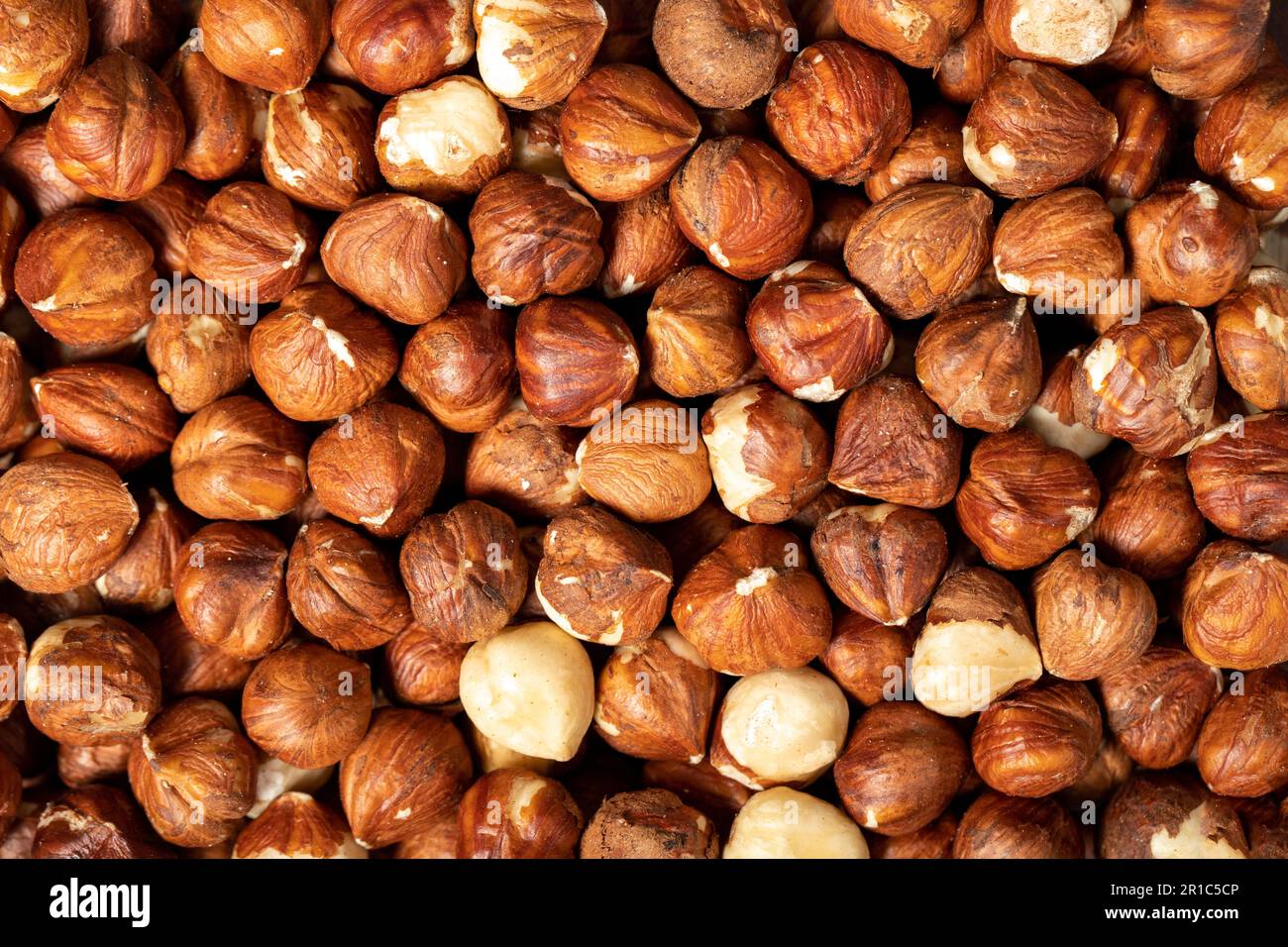 Hazelnut. Peeled hazelnuts closeup food background. Texture. Top view ...