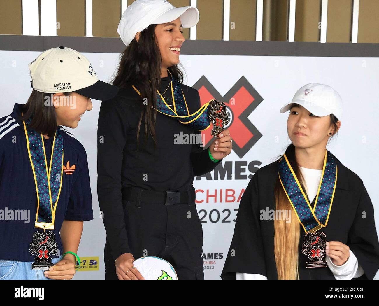 (L-R) Momiji Nishiya of Japan, 2nd, Jhulia Rayssa Mendes Leal of Brazil ...