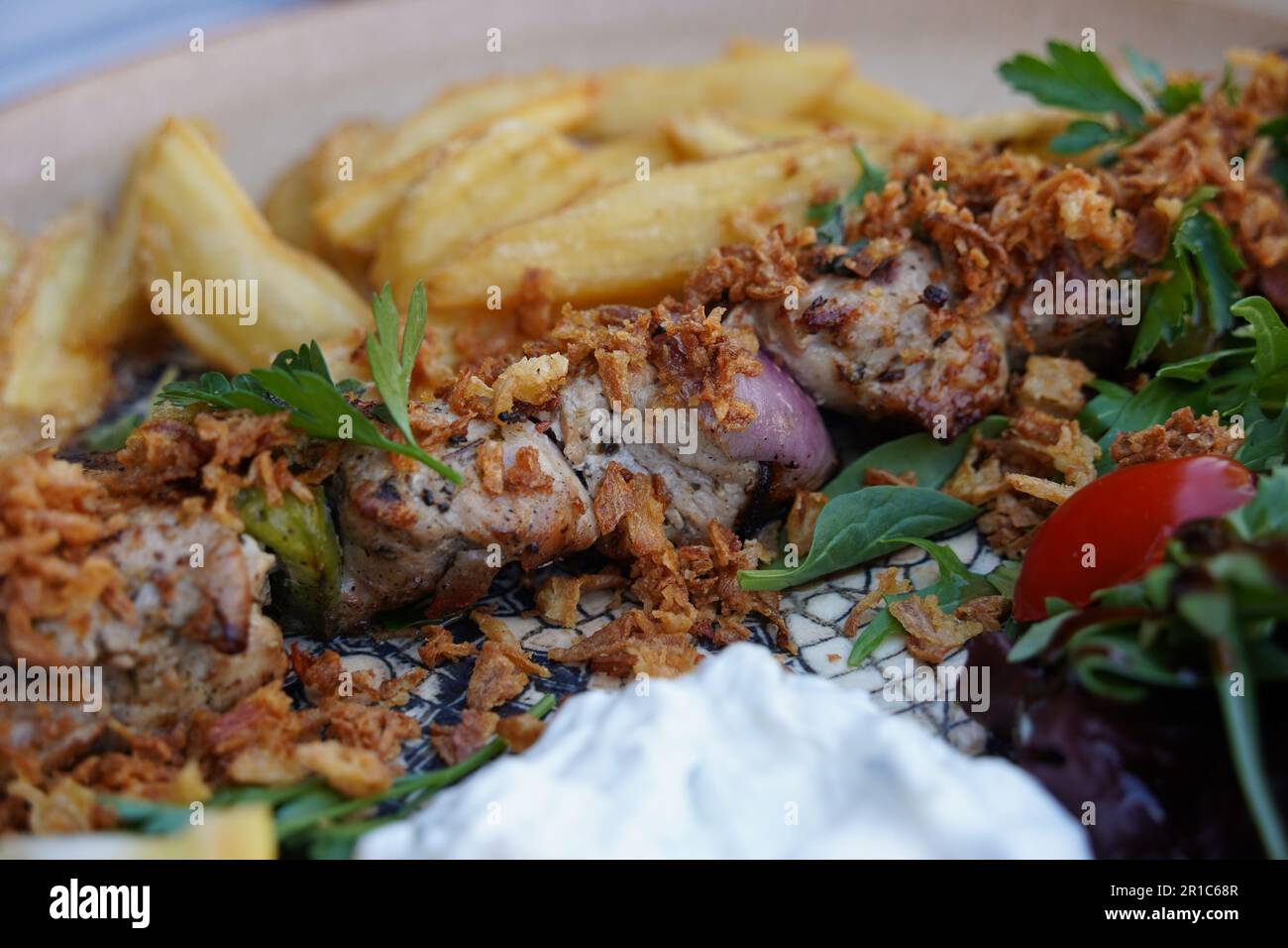 Souvlaki, meat skewers, traditional Greek meat food on pita bread ...