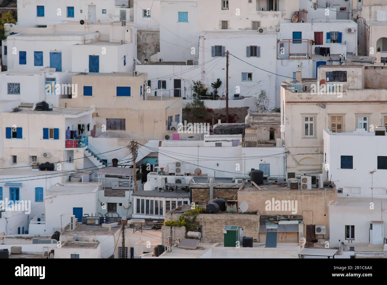 View of the beautiful whitewashed village of Ios in Greece, also known ...