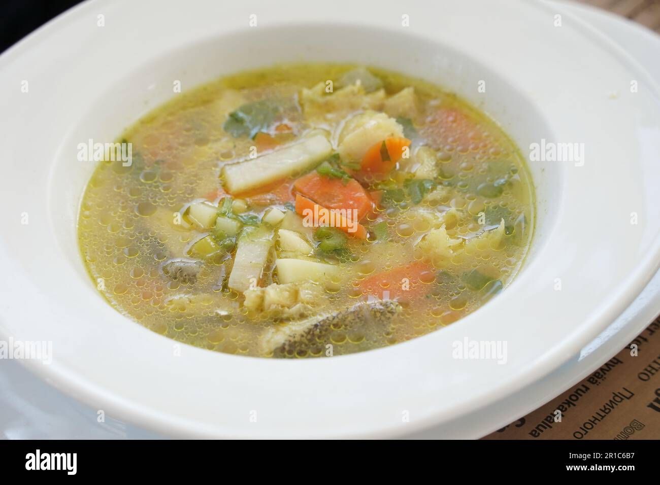Psarosoupa - fish soup, traditional to Greek cuisine. Soup with white ...