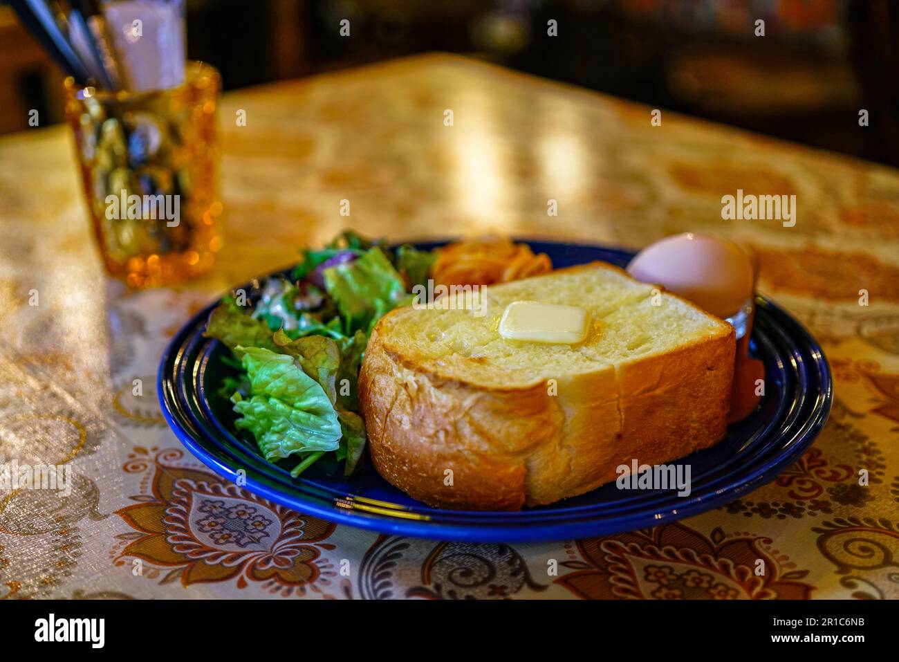 Breakfast of thick slices of buttered toast Stock Photo - Alamy