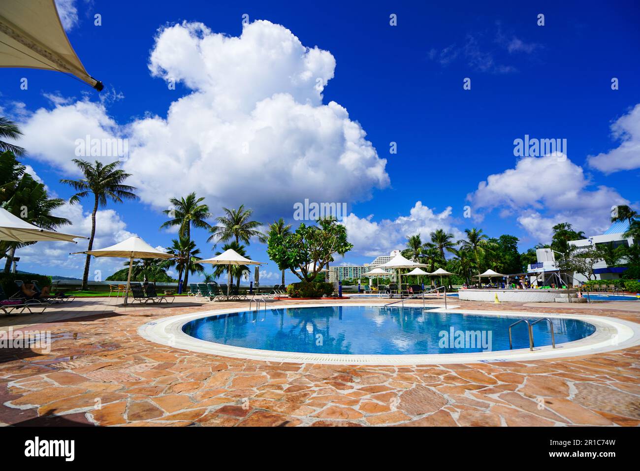 Swimming pool scenery at a hotel in Guam Stock Photo - Alamy