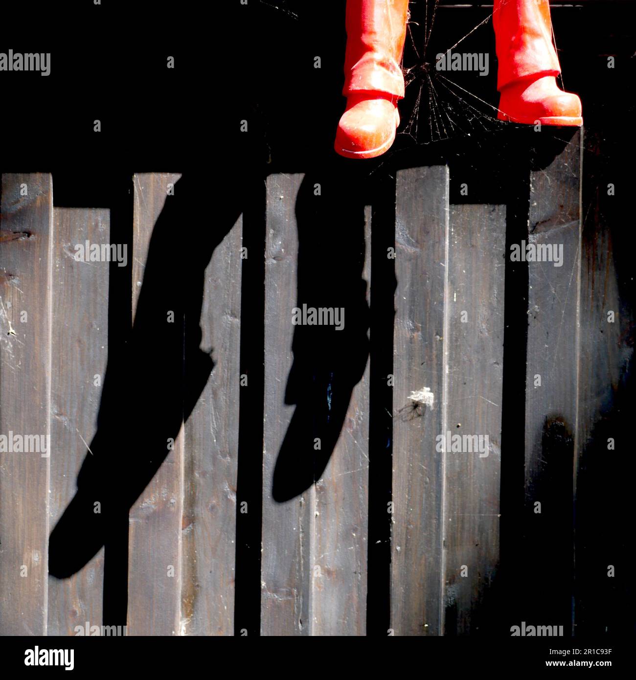 legs of a man sitting on the window sill Stock Photo - Alamy