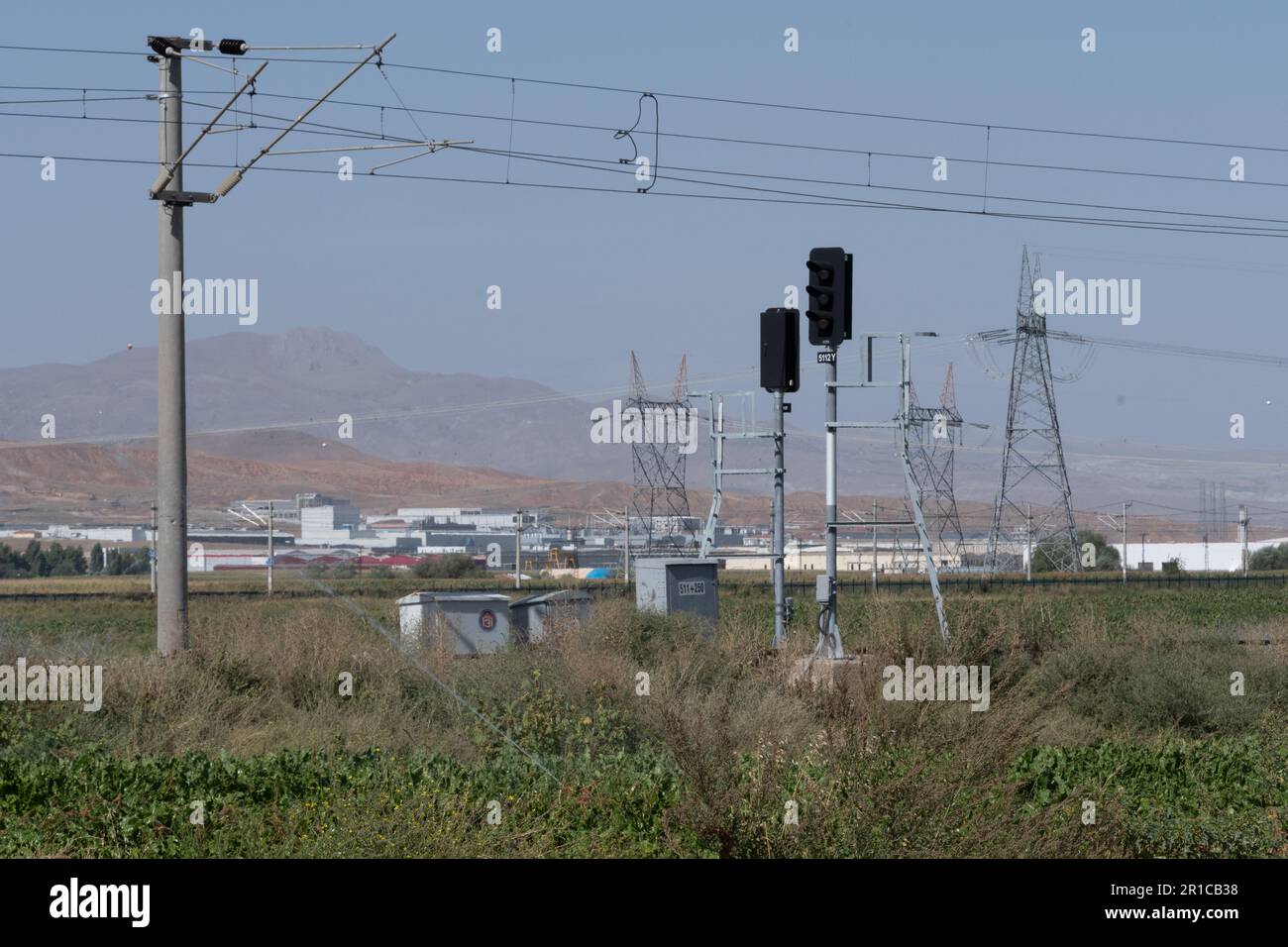 High voltage line on the railway line. roller electric pole Stock Photo ...