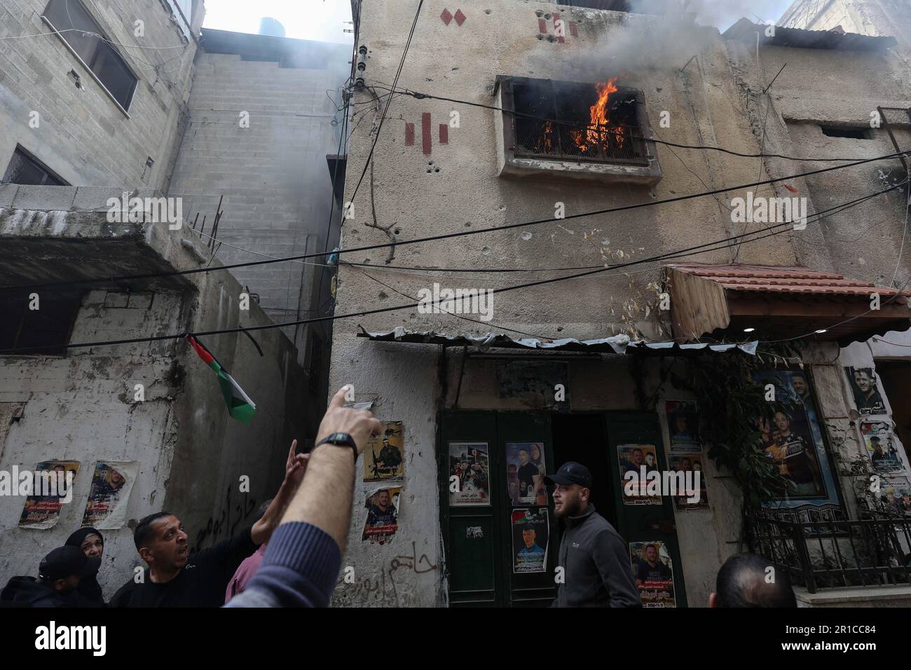 Nablus, Palestinian Territories. 13th May, 2023. Flames rise from the ...