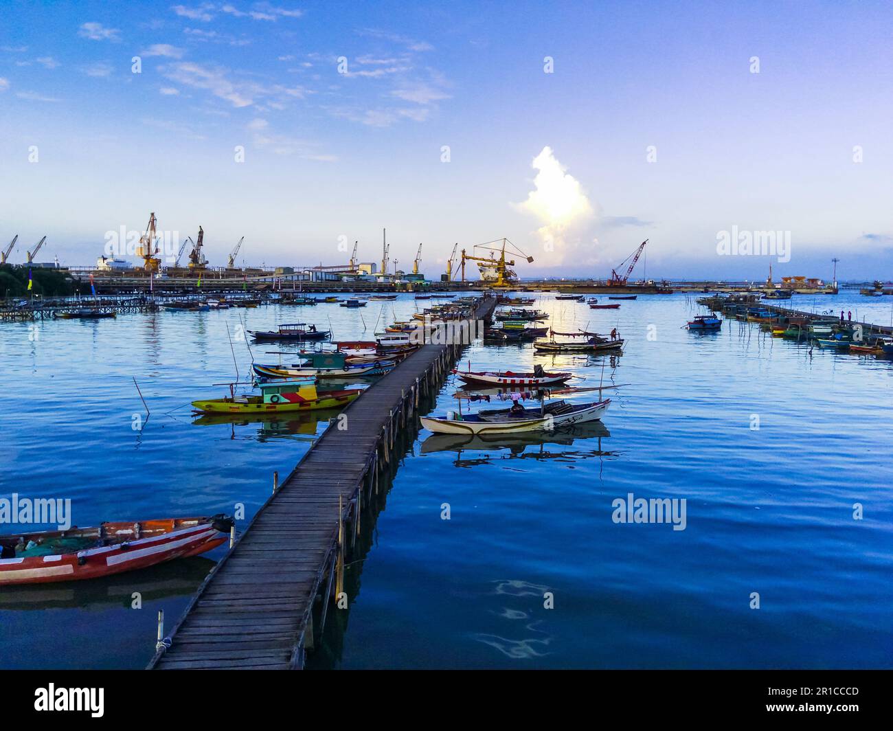 Aerial top down on traditional colourful asian fisherman boats moored ...