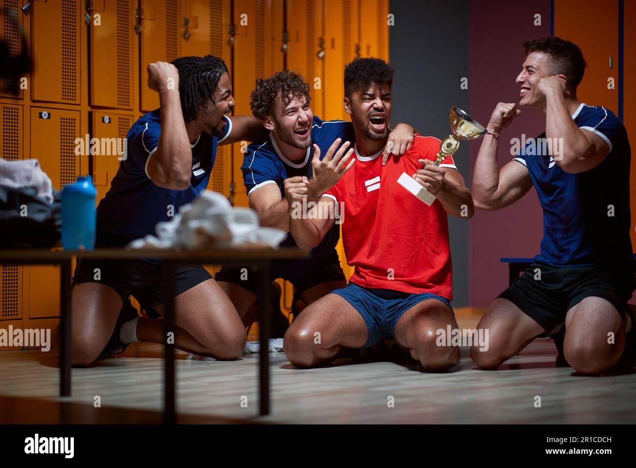 Team of young sports players feeling excited about the win in the ...