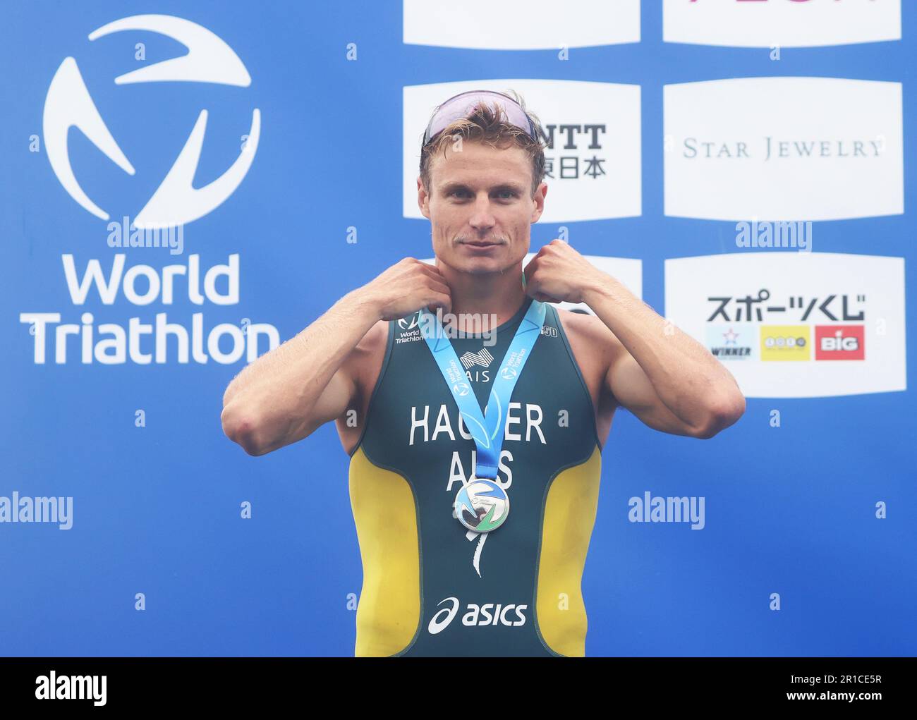 Matthew Hauser of Australia, 2nd, celebrates during an award ceremony ...