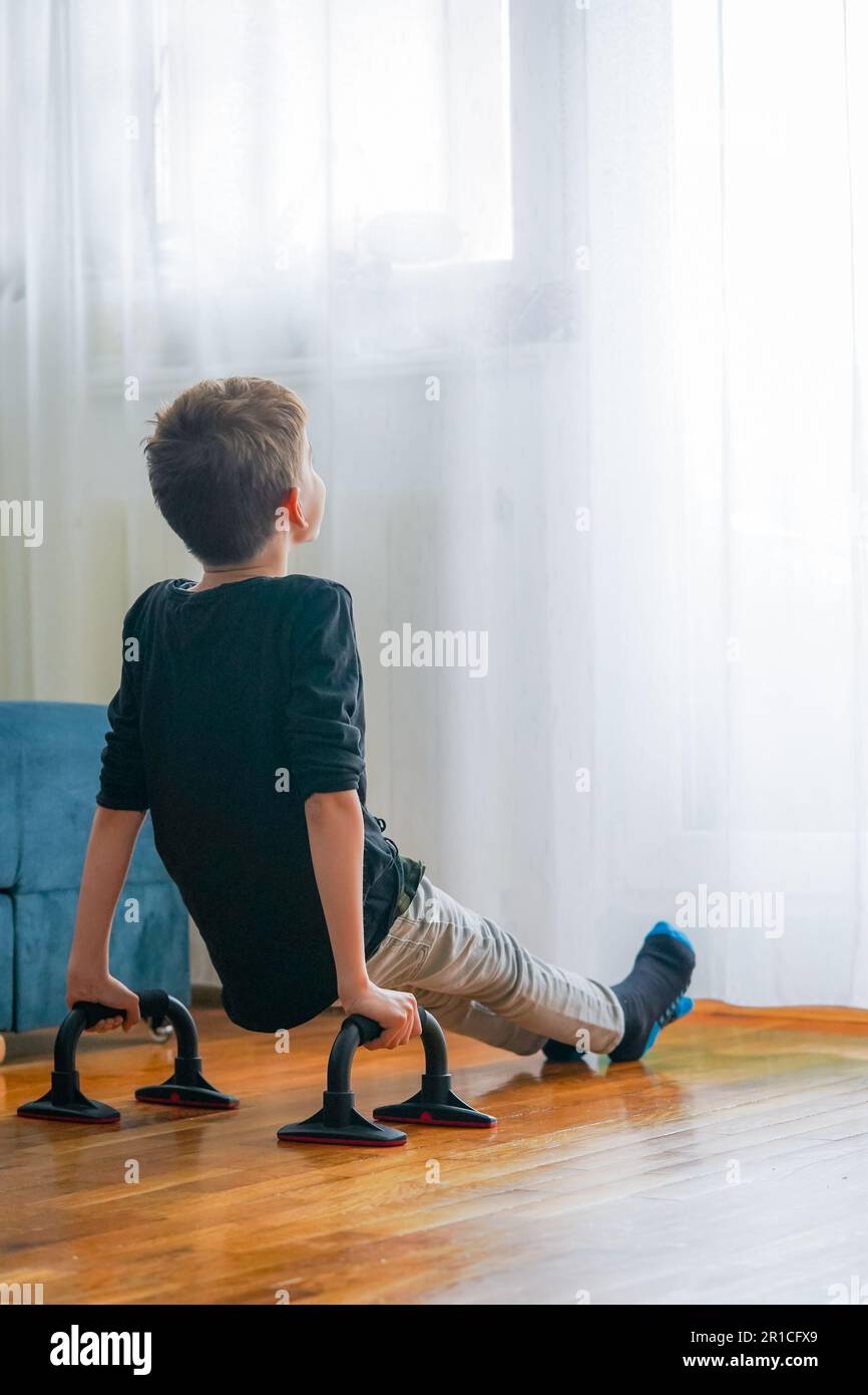 Active Kids at Home: Little Fitness Enthusiast Enjoying Indoor Exercise ...