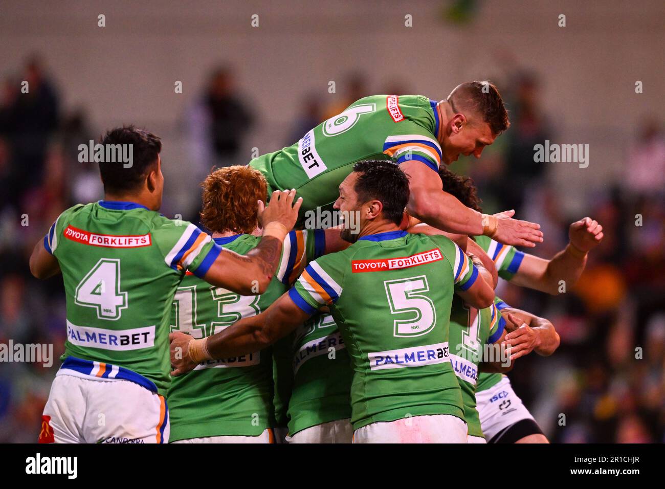 Sebastian Kris of the Raiders celebrates with team mates after scoring ...