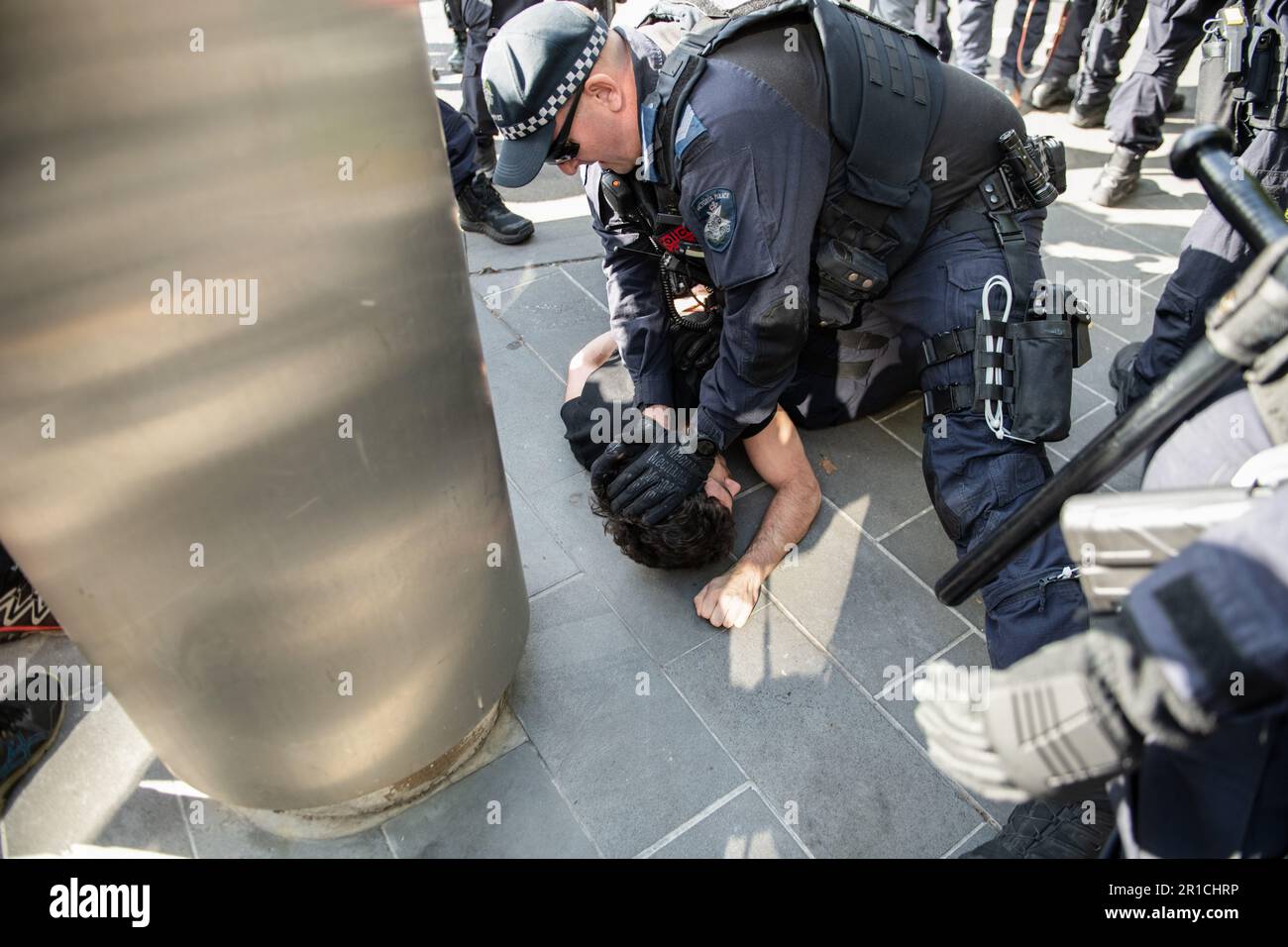Policeman arrests an anti-fascist protester during the demonstration. A ...