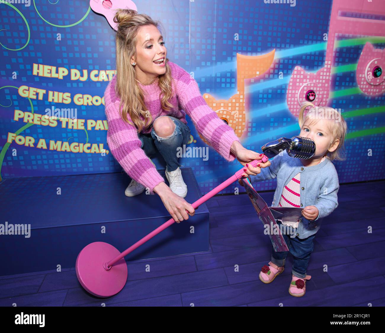 EDITORIAL USE ONLY Rachel Riley with daughter Noah attend the opening ...