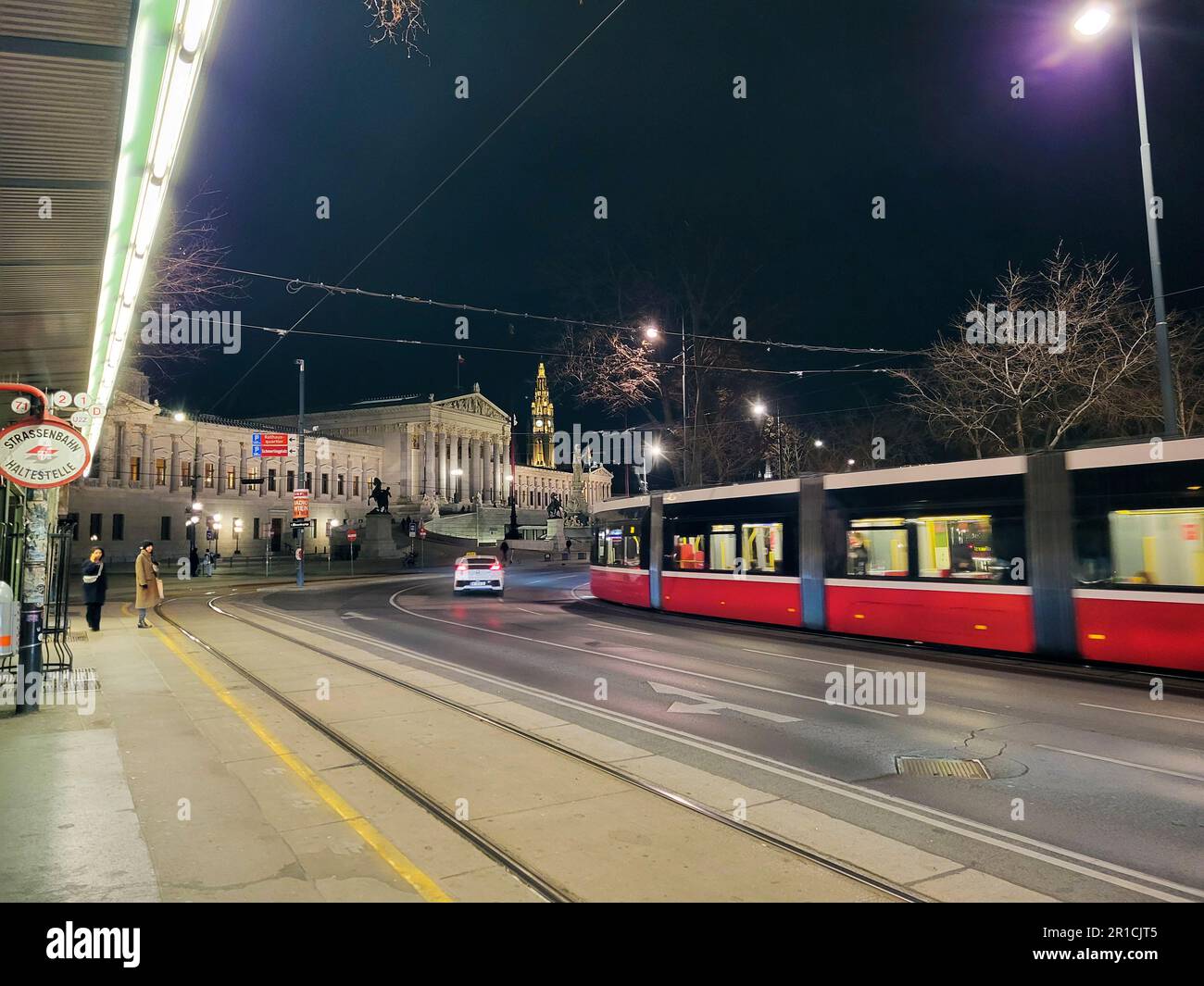 Vienna, Austria - March 20, 2023: Tram and station with parliament of ...