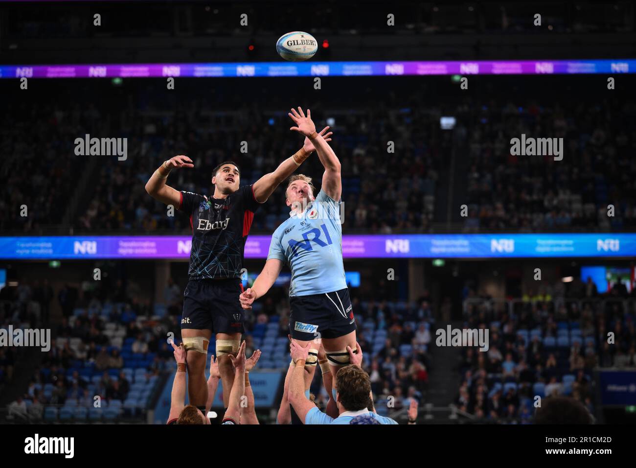Trevor Hosea of the Rebels and Hugh Sinclair of the Waratahs during the ...