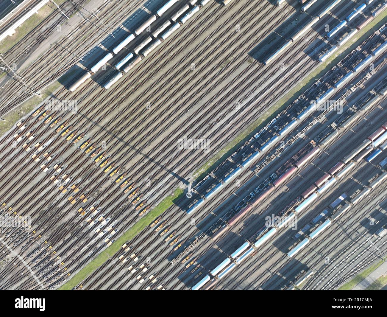 Aerial drone footage top down view of a picturesque locomotive depot ...