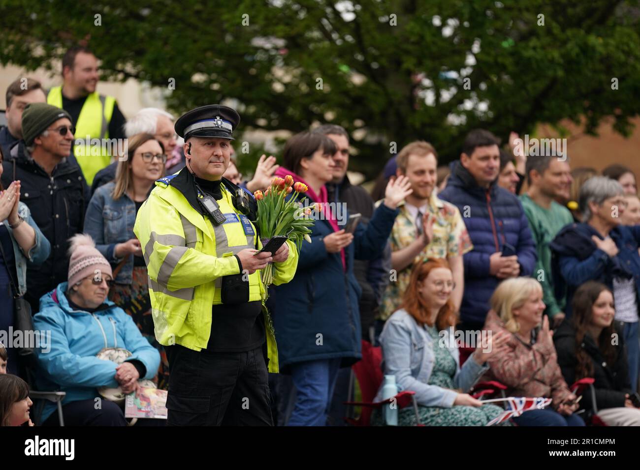 People watching the Spalding Flower Parade as it makes its way through ...