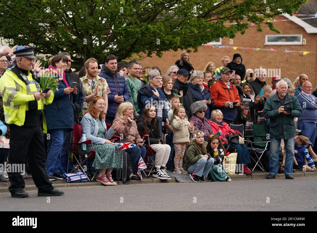 People watching the Spalding Flower Parade as it makes its way through ...
