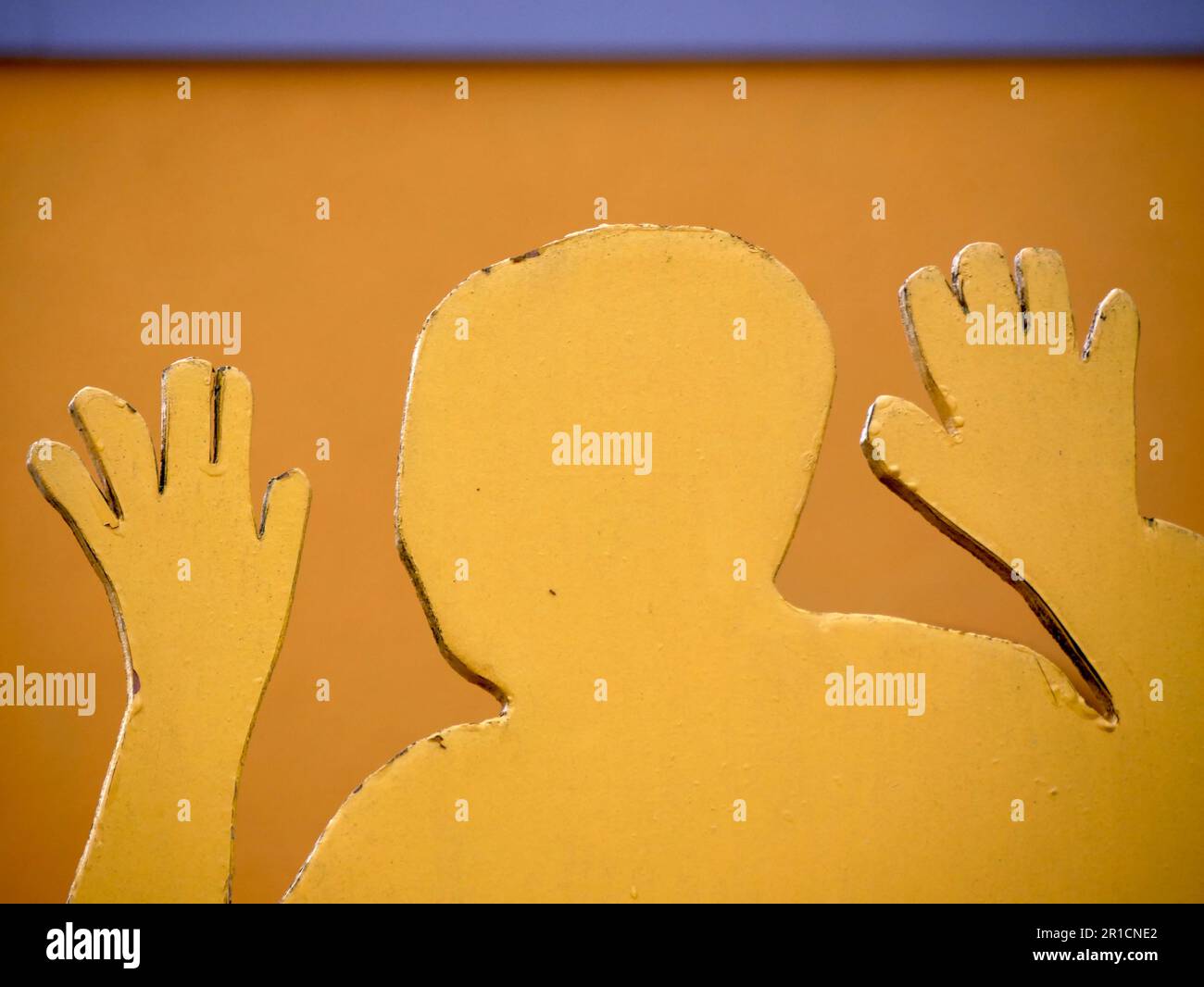 yellow cardboard man holding high hands like a goalkeeper Stock Photo ...