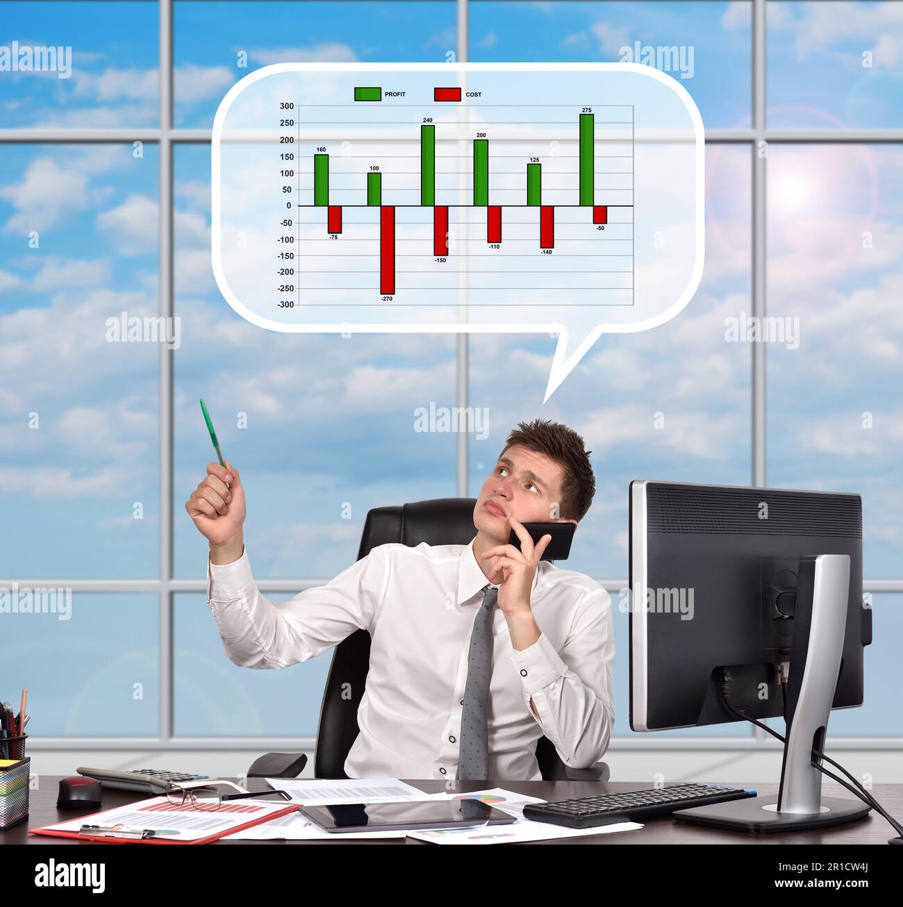 businessman sitting in office and thinking about chart of profit and ...