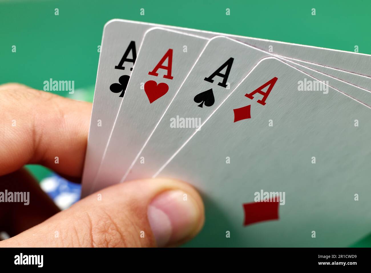 hand holding four aces, extra close up Stock Photo - Alamy