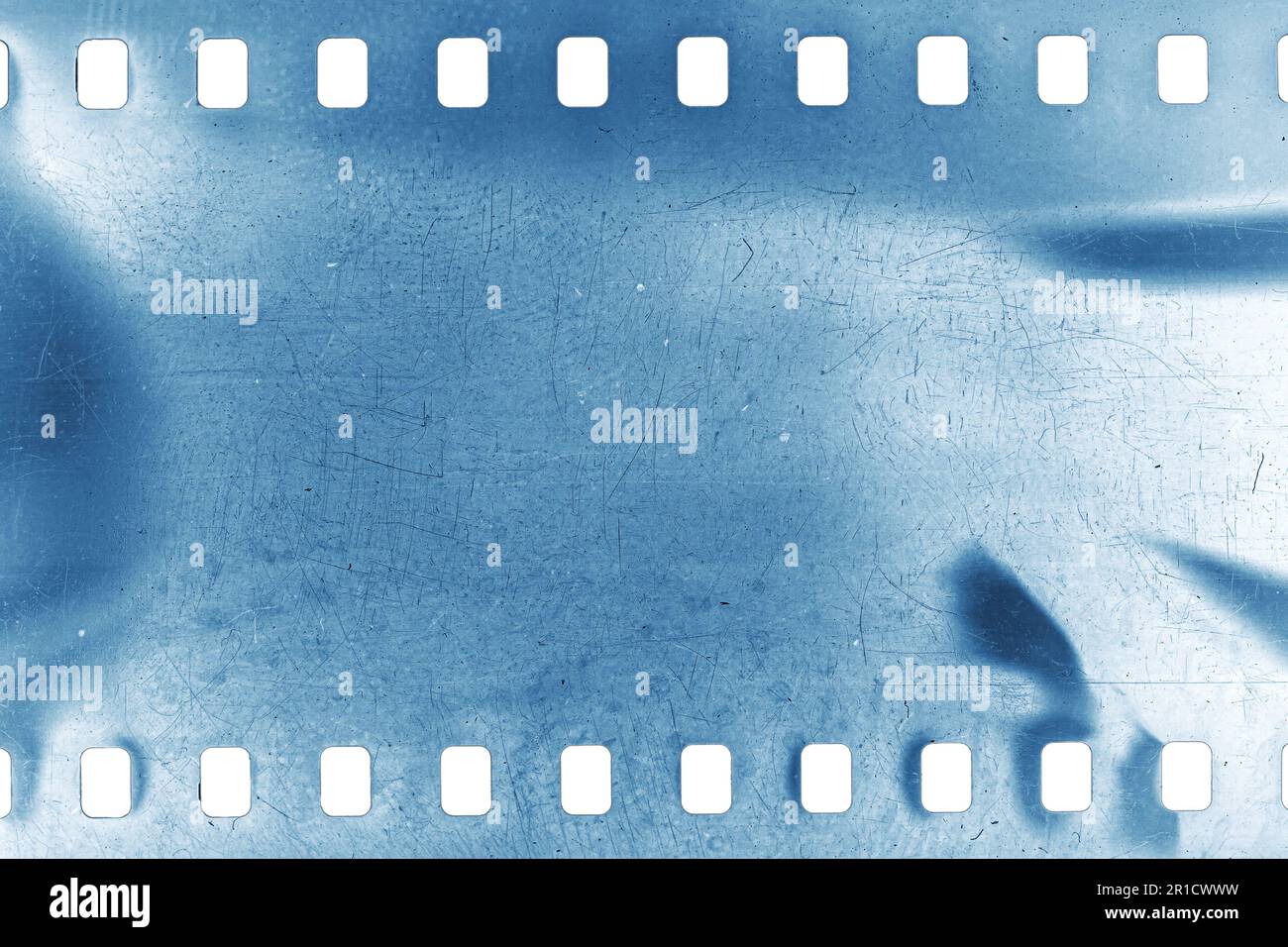 Dusty and grungy 35mm film texture or surface. Perforated scratched ...