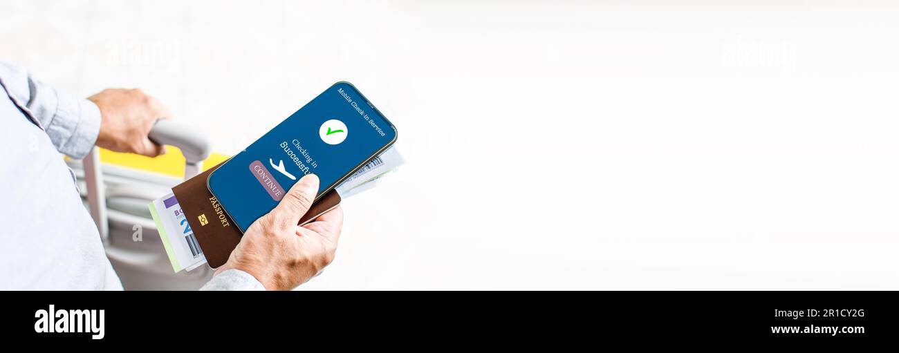 Tourists holding smartphones showing Concept Mobile check-in app check ...