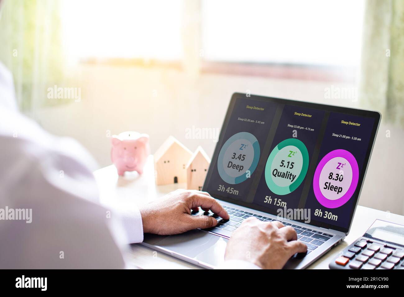man trying a keyboard to watch sleep function monitor. laptop screen ...