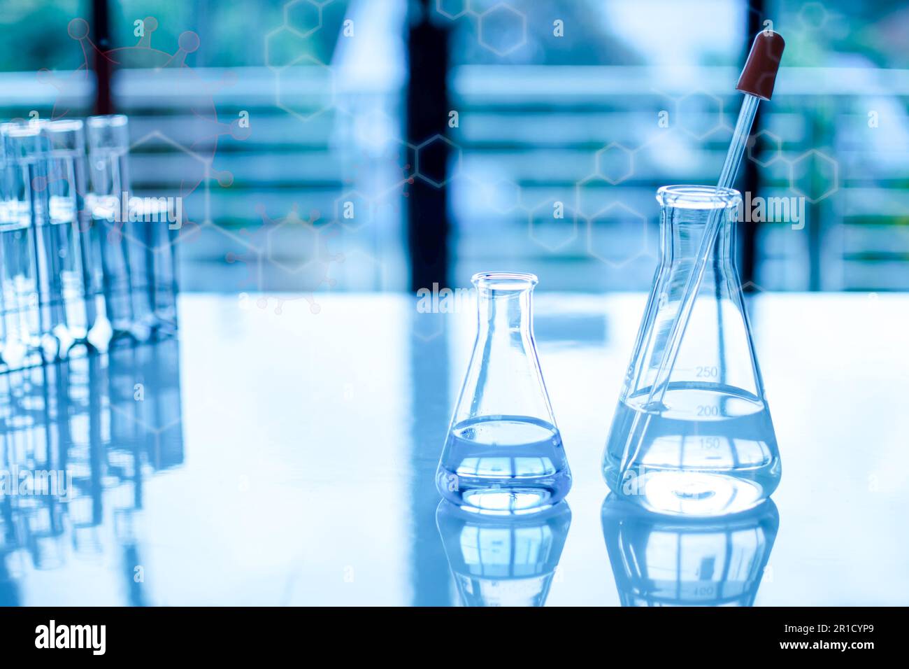Chemistry experiment concept in science laboratory Two science flasks ...